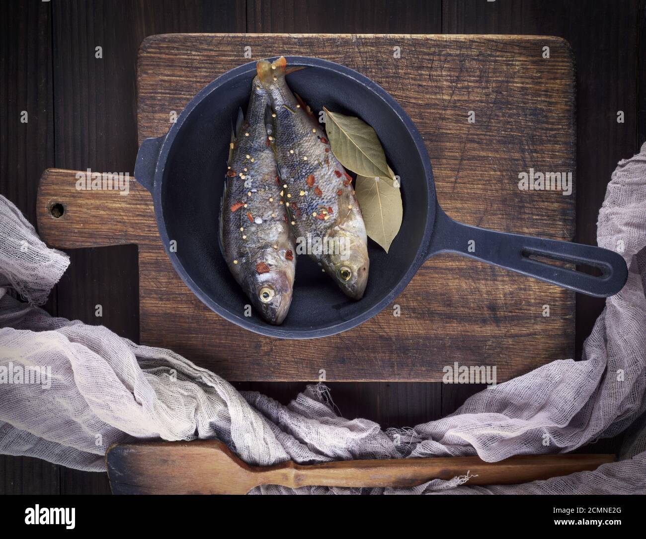 fresh peeled fish from scales with spices Stock Photo - Alamy