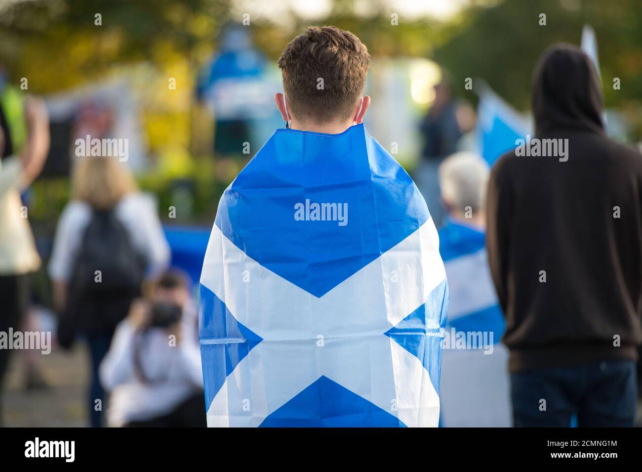 Wearing flag over shoulders hi-res stock photography and images - Alamy