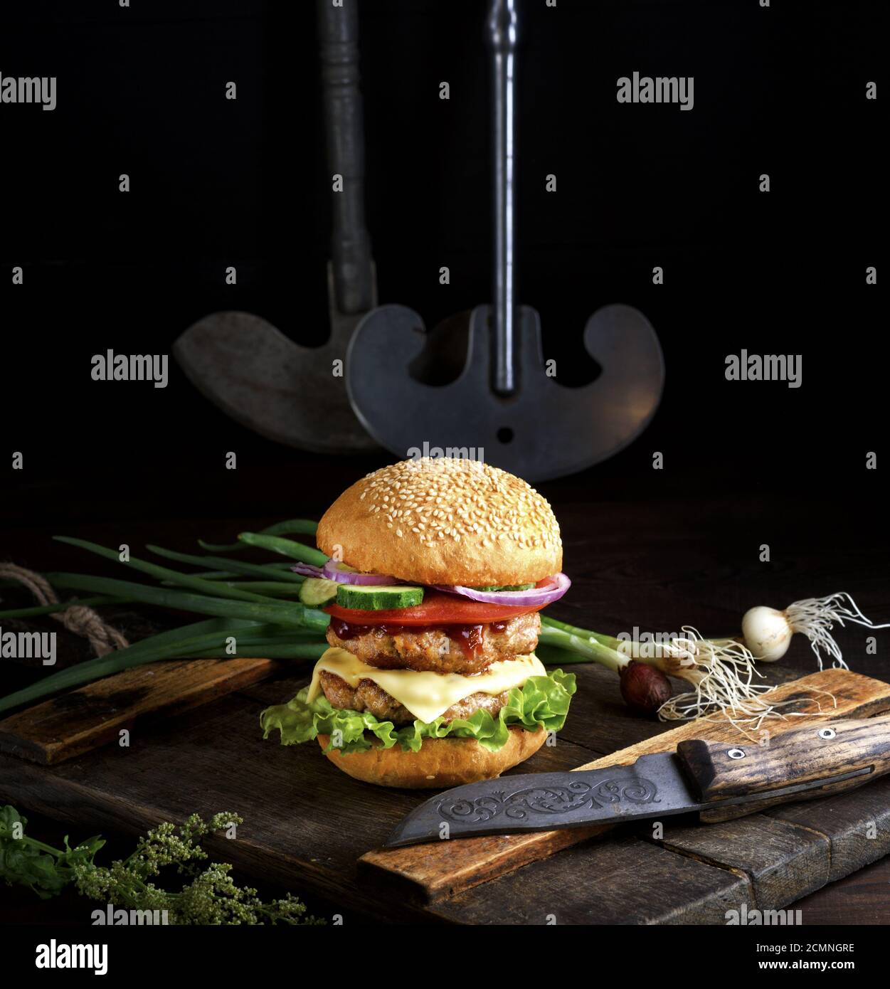 double cheeseburger with vegetables Stock Photo - Alamy