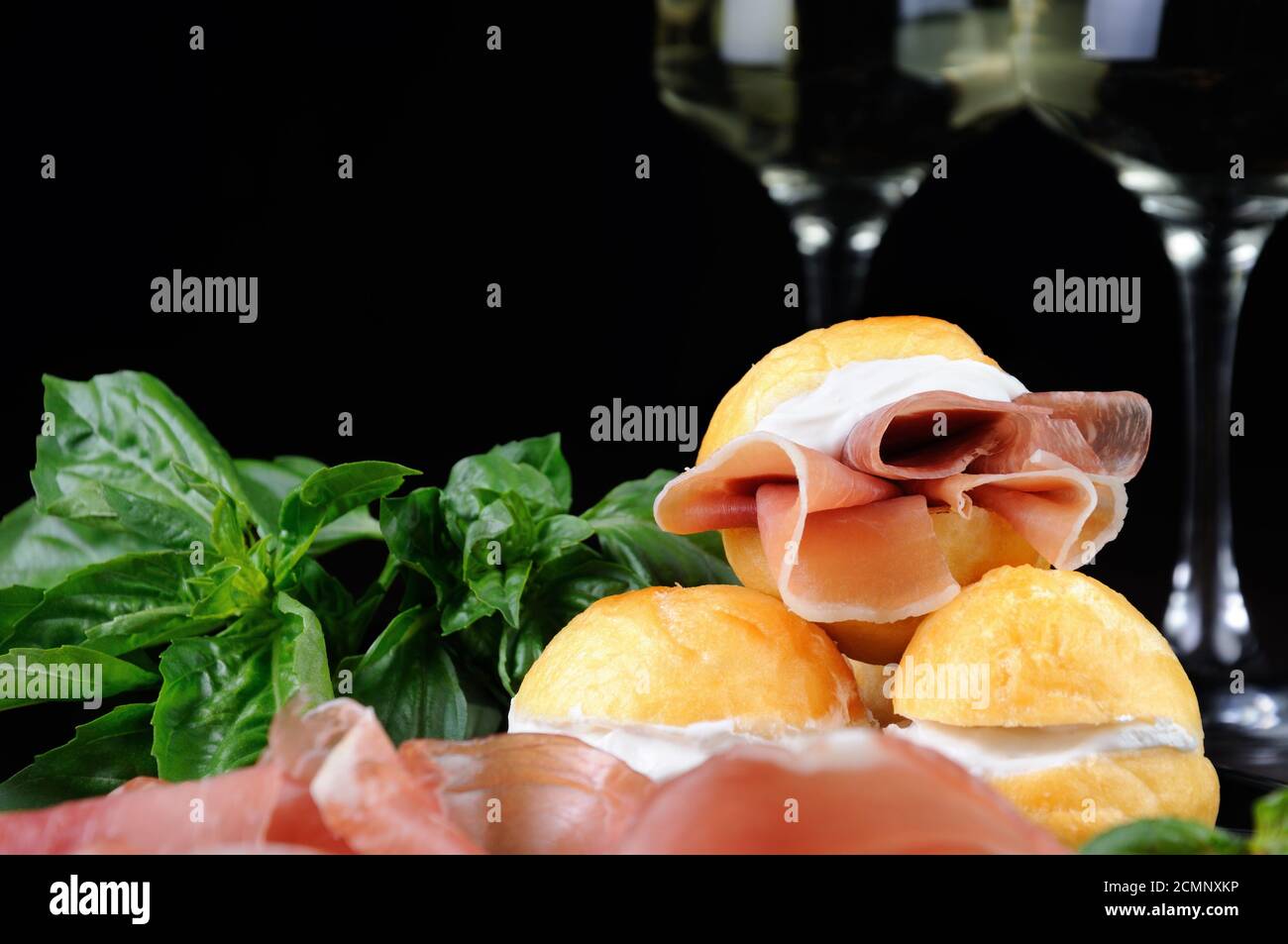 Coccoli is an appetizer from Italy. Pizza dough balls are fried and ...