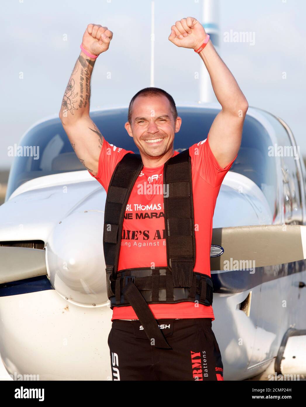 World kickboxing champion Carl Thomas celebrates after completing a ...