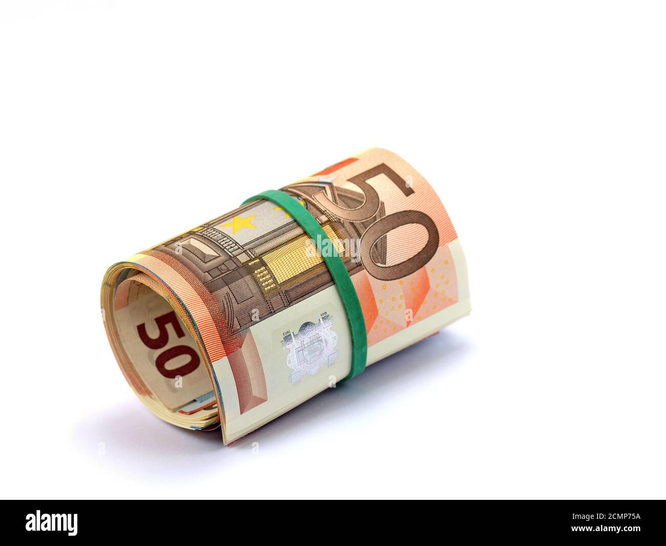 Rolled wad of Euro banknotes against white background Stock Photo - Alamy