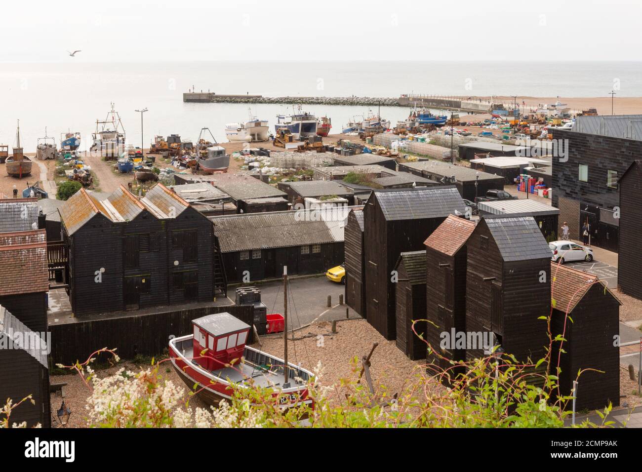Fishermens muti-storey traditional storage sheds, foreground, where ...