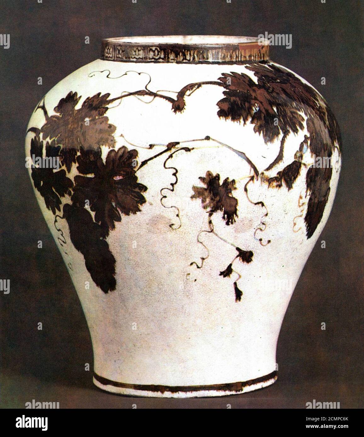 Joseon white porcelain jar with underglaze iron grape design Stock ...