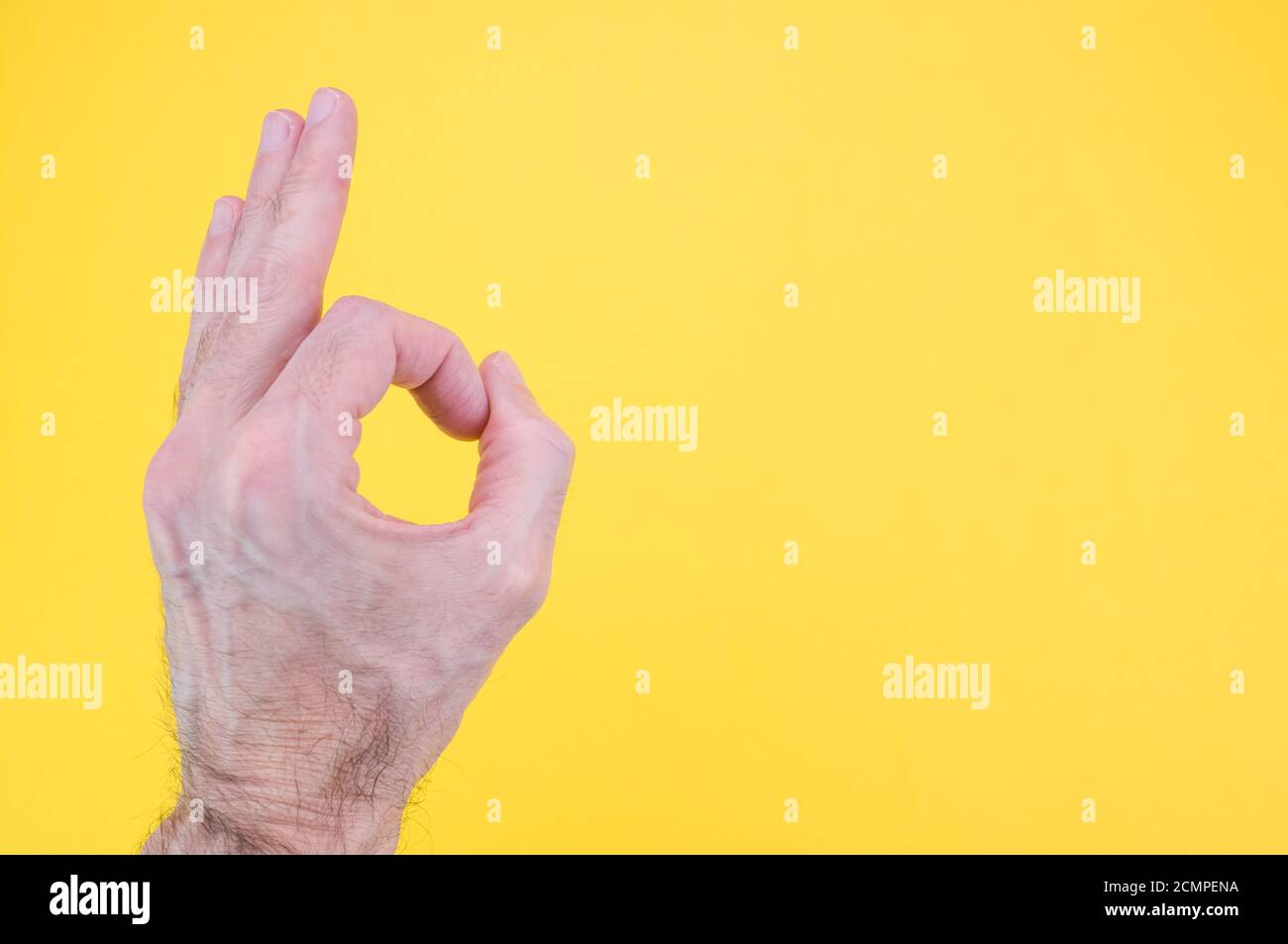 male hand showing OK gesture Stock Photo - Alamy