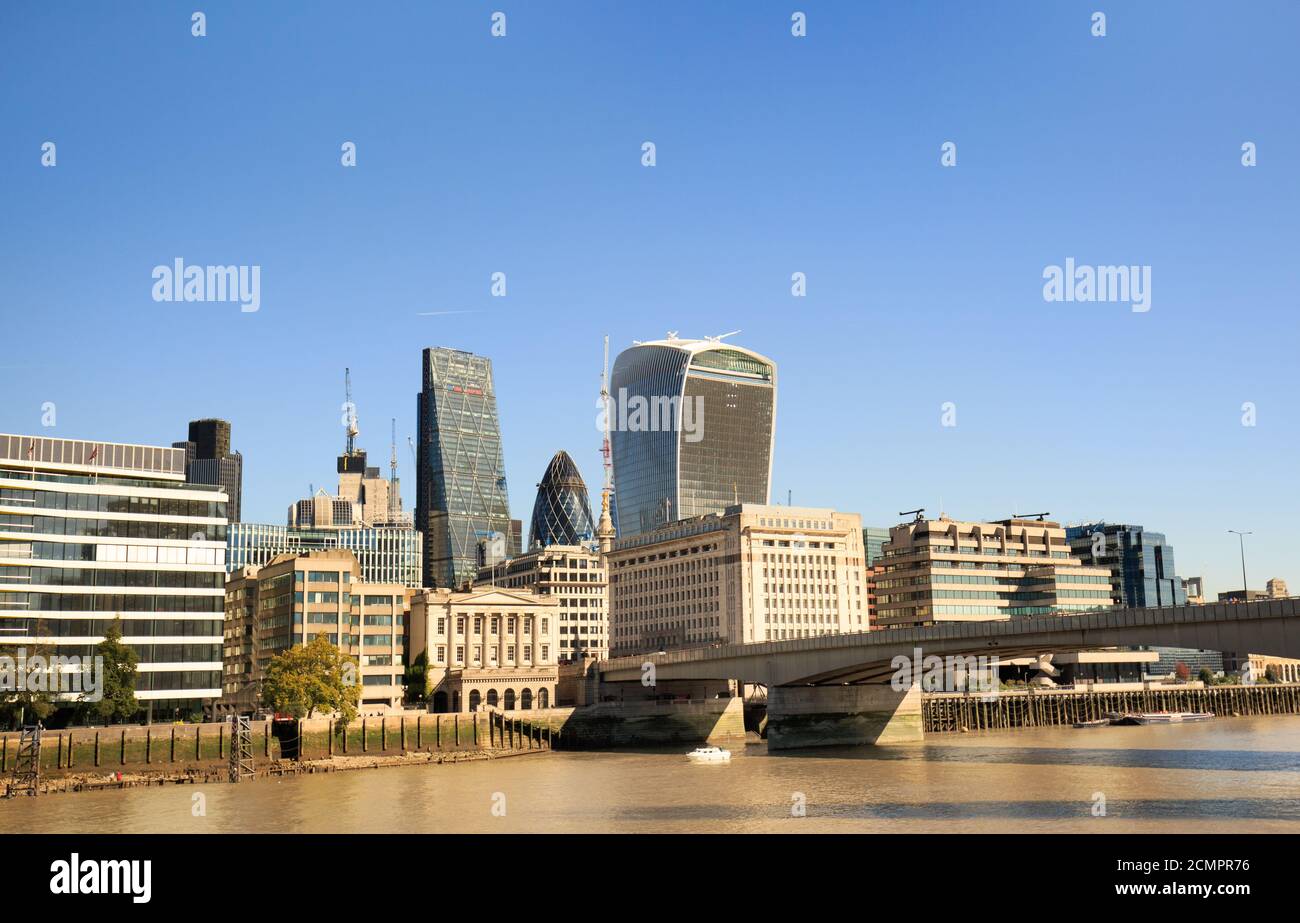 London Bridge spanning The River Thames in London with iconic buildings ...