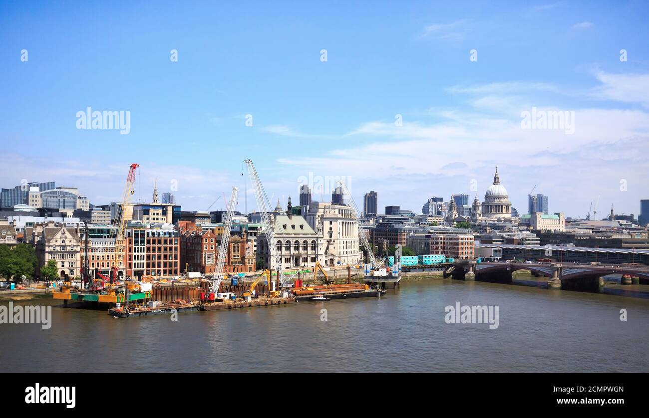 Panorama over the River Thames in London with various iconic buildings ...