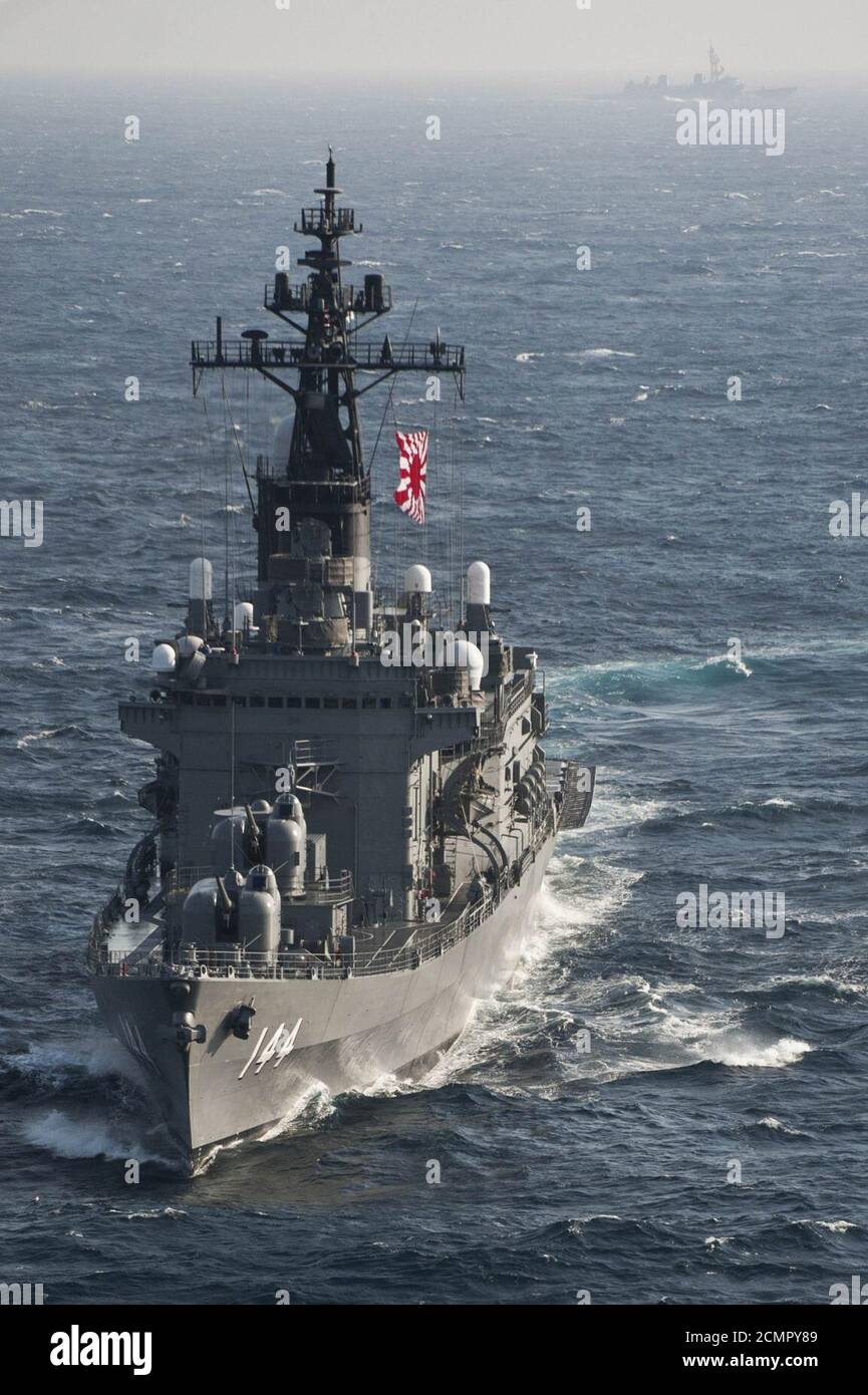JS Kurama sails in the East China Sea during a trilateral exercise, -21 ...