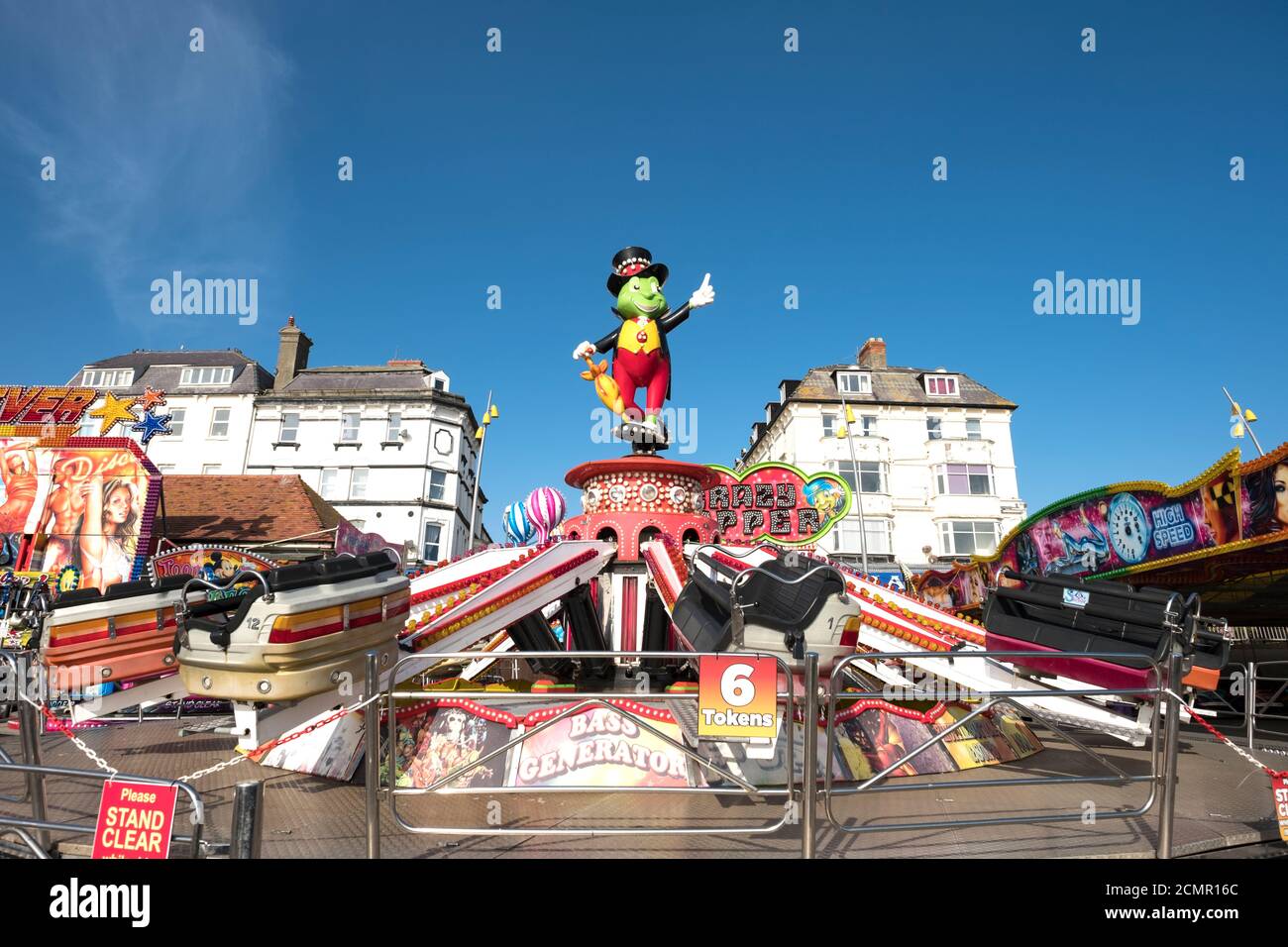 Cartoon frog figure on a fairground ride Stock Photo - Alamy