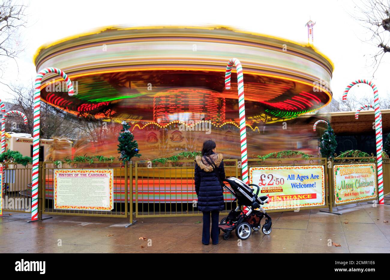 Motion blur of a colourful carousel spinning Stock Photo - Alamy