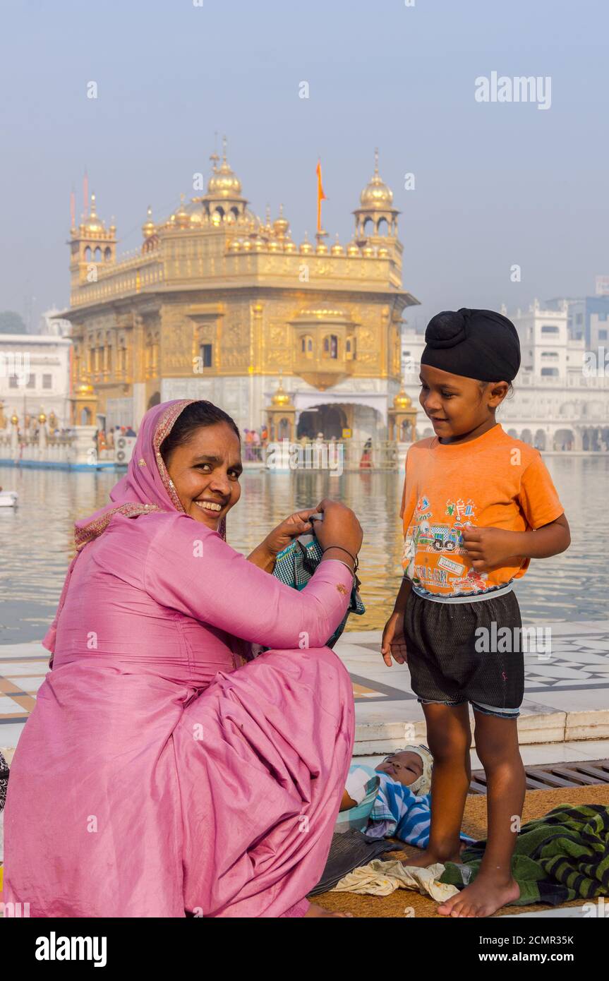 Amritsar, India - November 21, 2011: The Sikh family of pilgrims ...