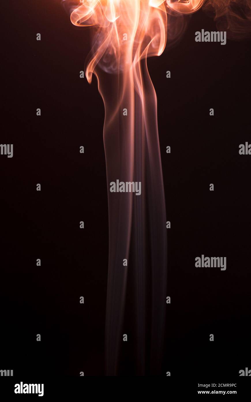 Beautiful smoke on the black background - macro photo Stock Photo - Alamy