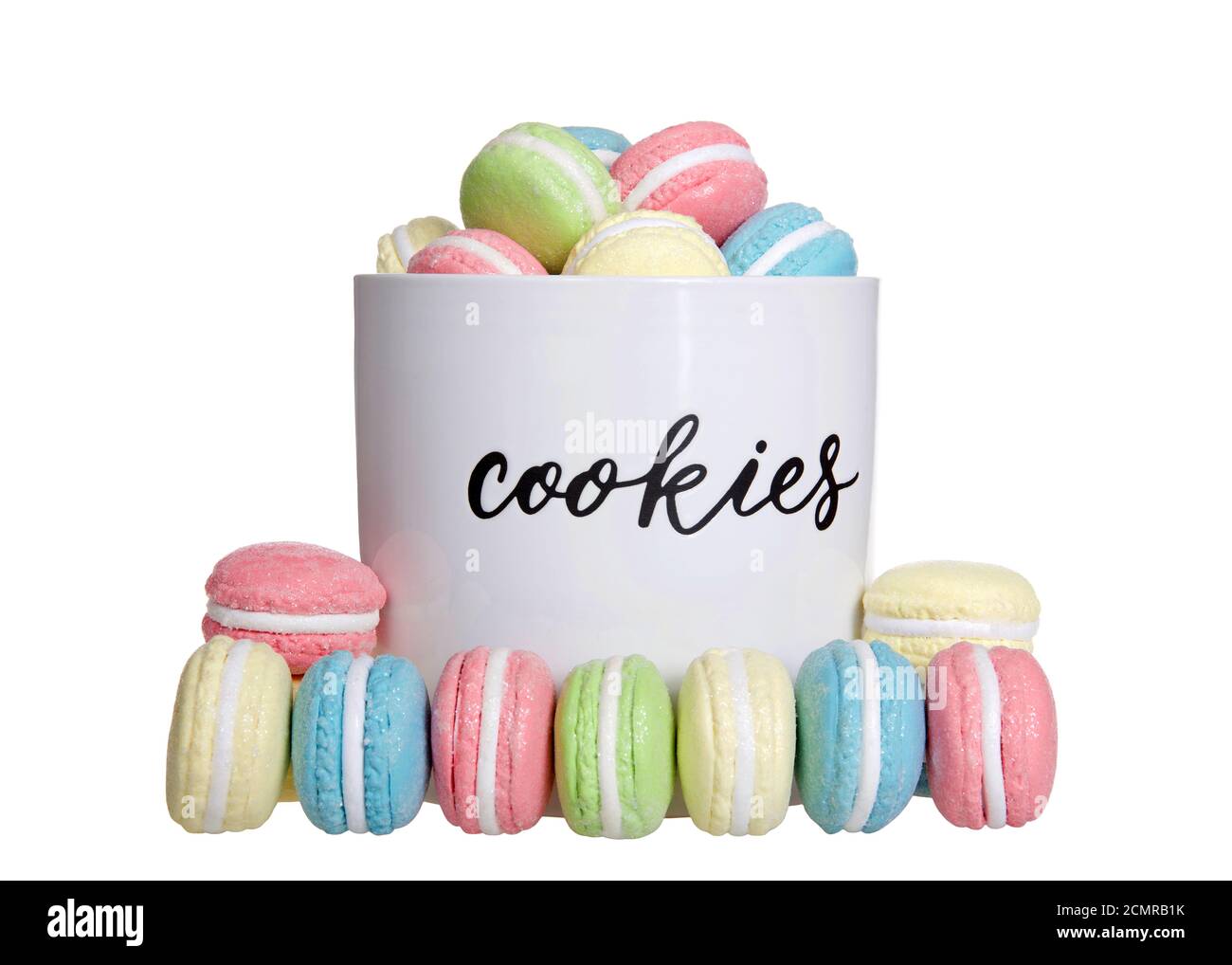 Porcelain cookie jar labeled, with macaron cookies overflowing inside ...