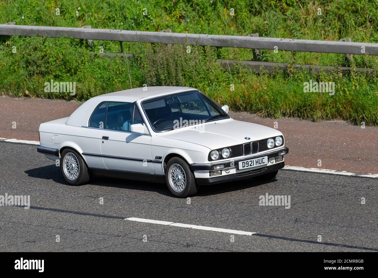 1986 80s eighties white BMW 325I; Vehicular traffic moving vehicles ...