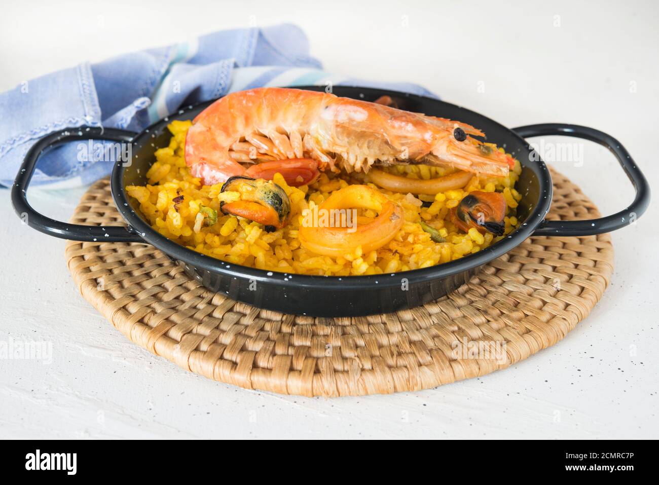 Paella typical spanish food in granite background Stock Photo - Alamy