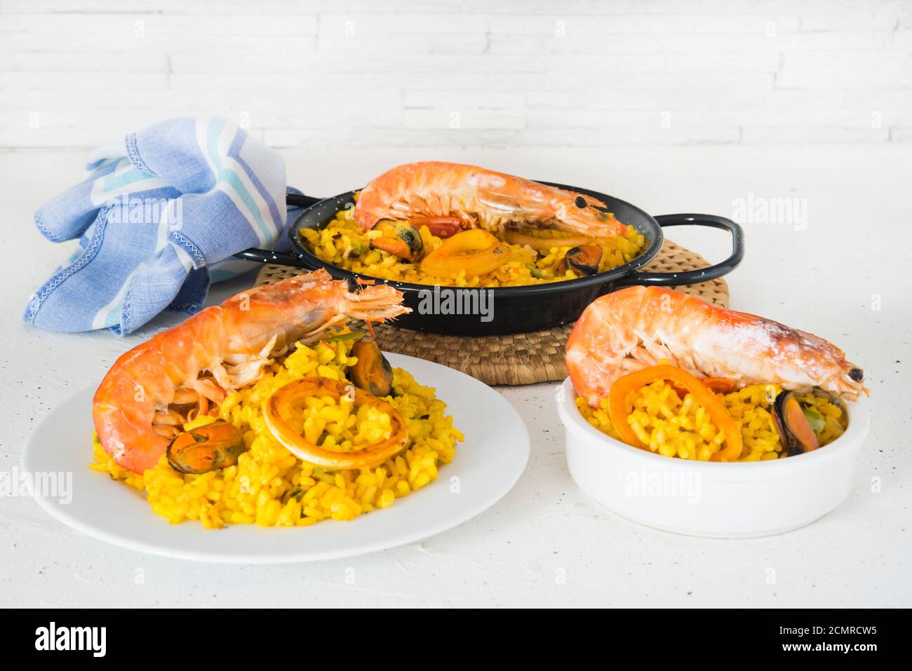 Paella typical spanish food in granite background Stock Photo - Alamy