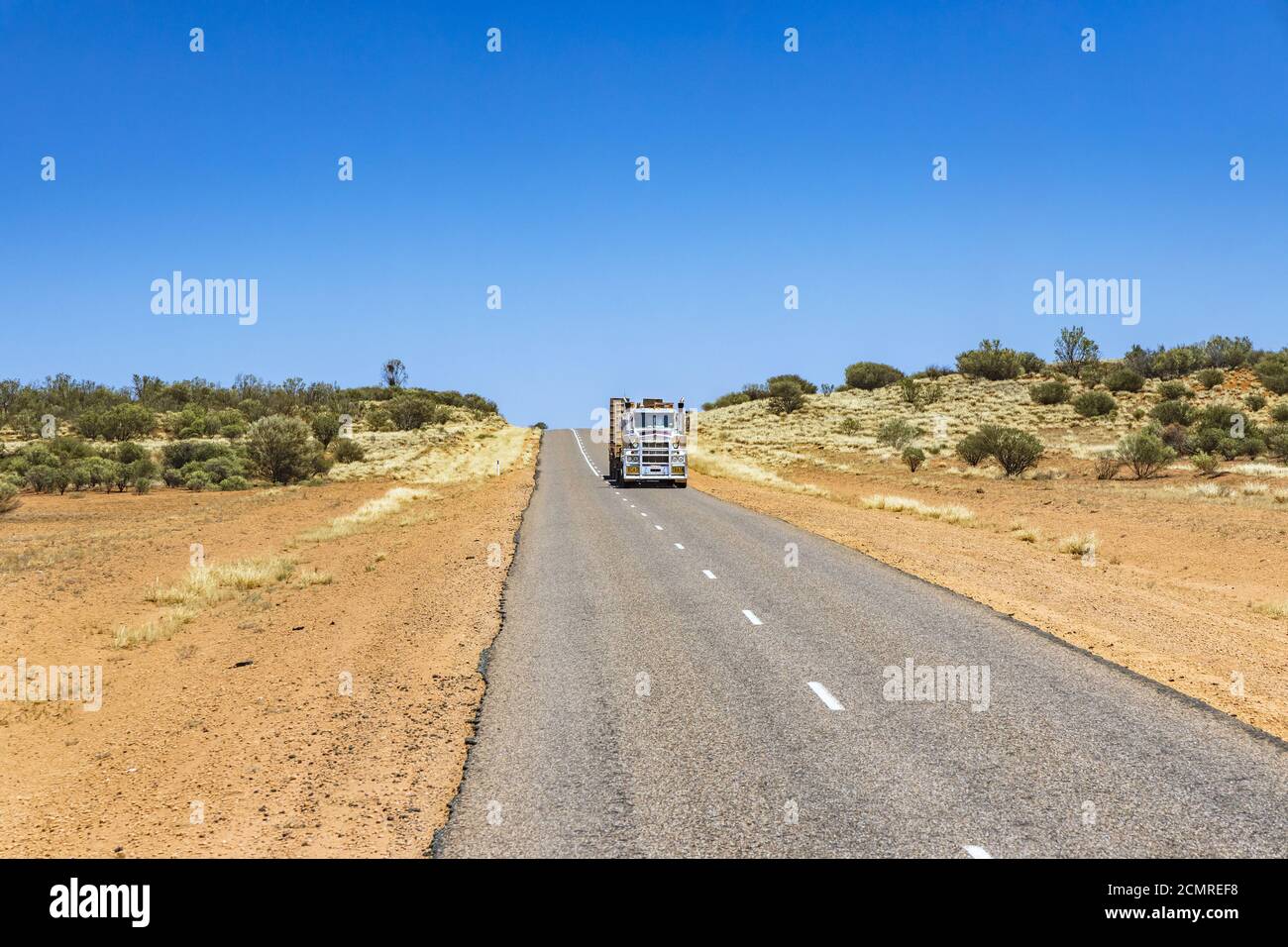 On the Lasseter Highway towards Uluru in the Australian outback in the ...