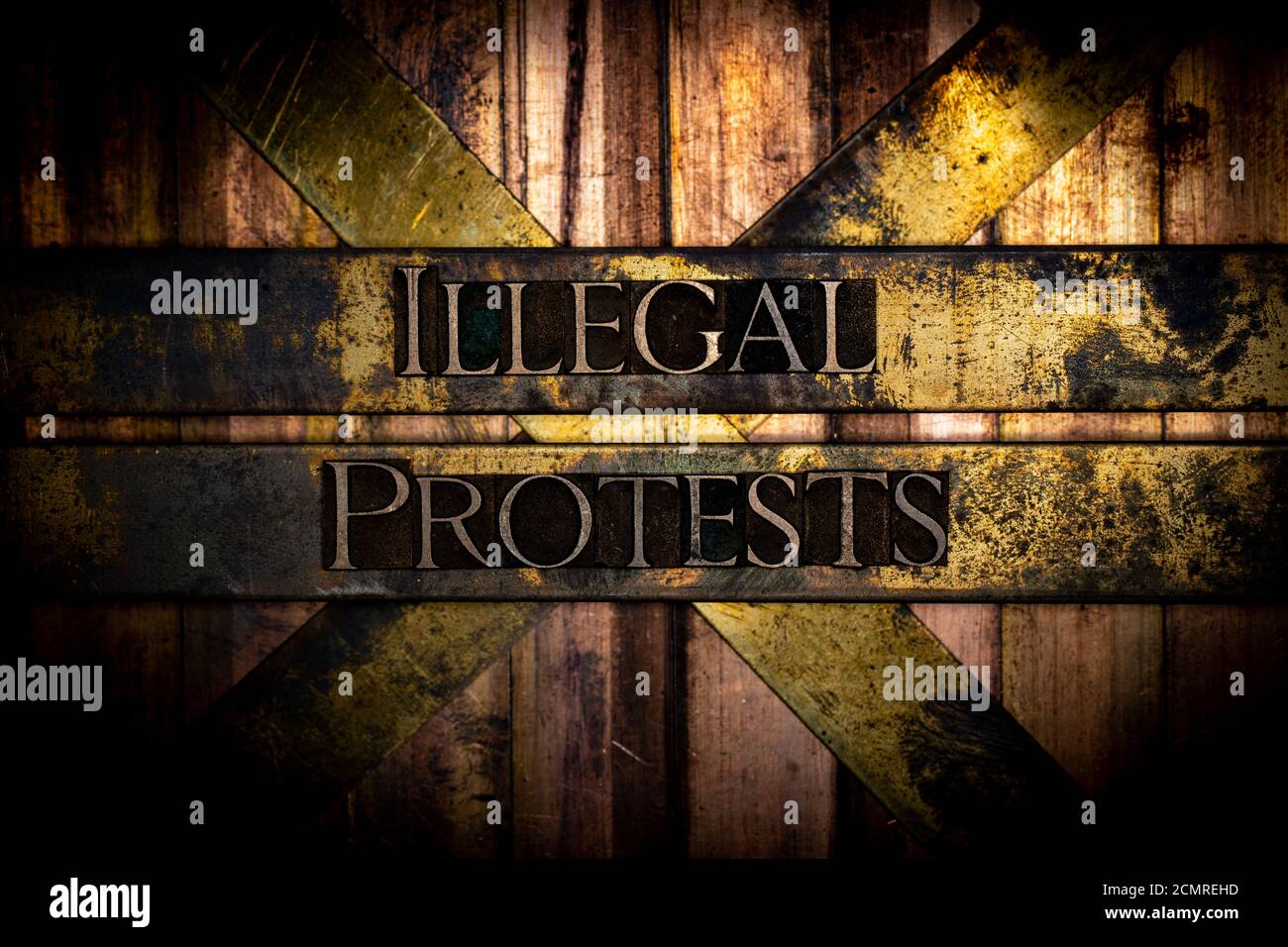 Illegal Protests text formed with real authentic typeset letters on ...