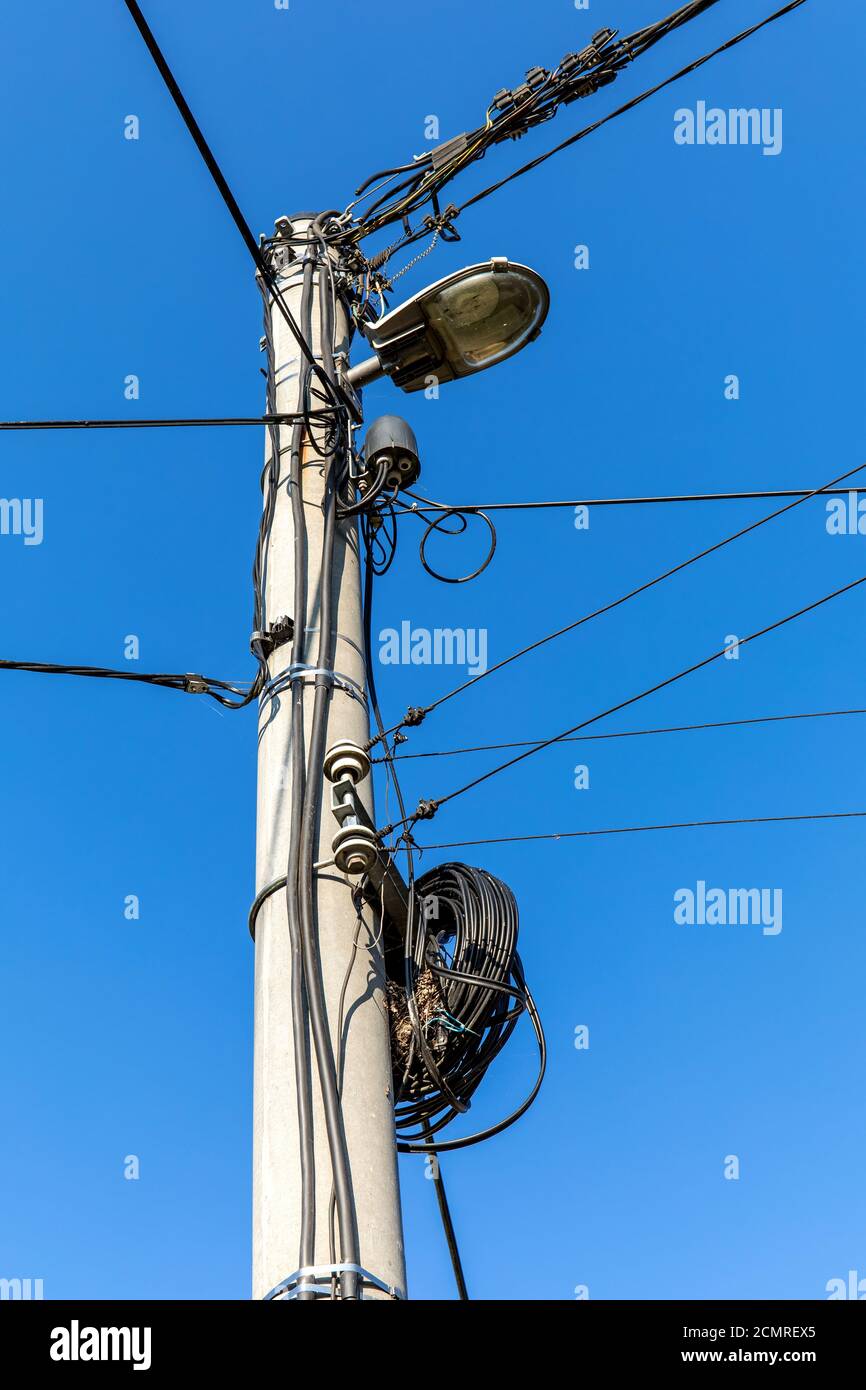Electric pole with wires and power equipment. street light electricity ...