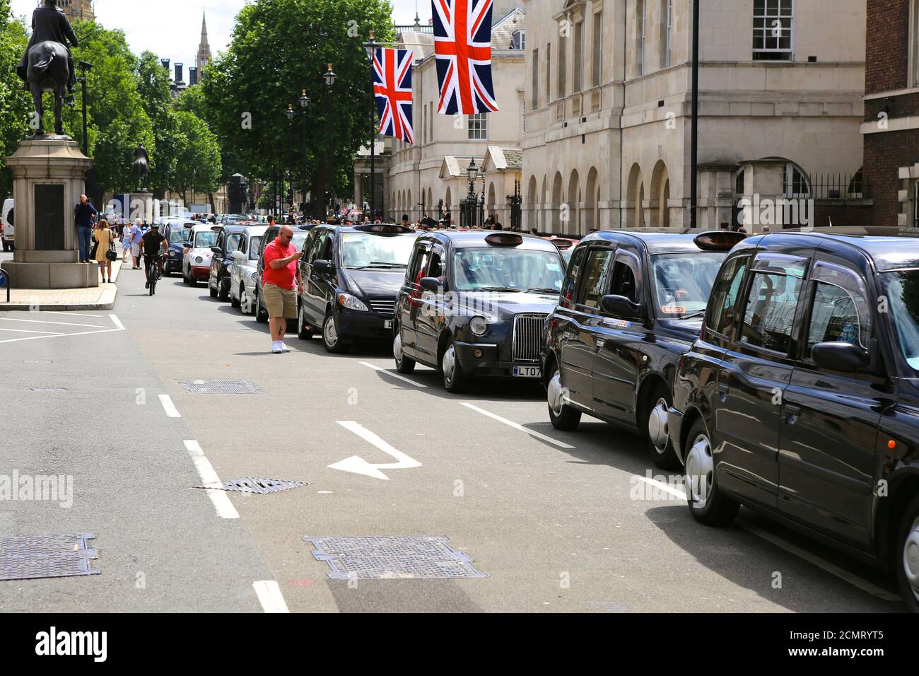 Uber taxi people street london hi-res stock photography and images - Alamy