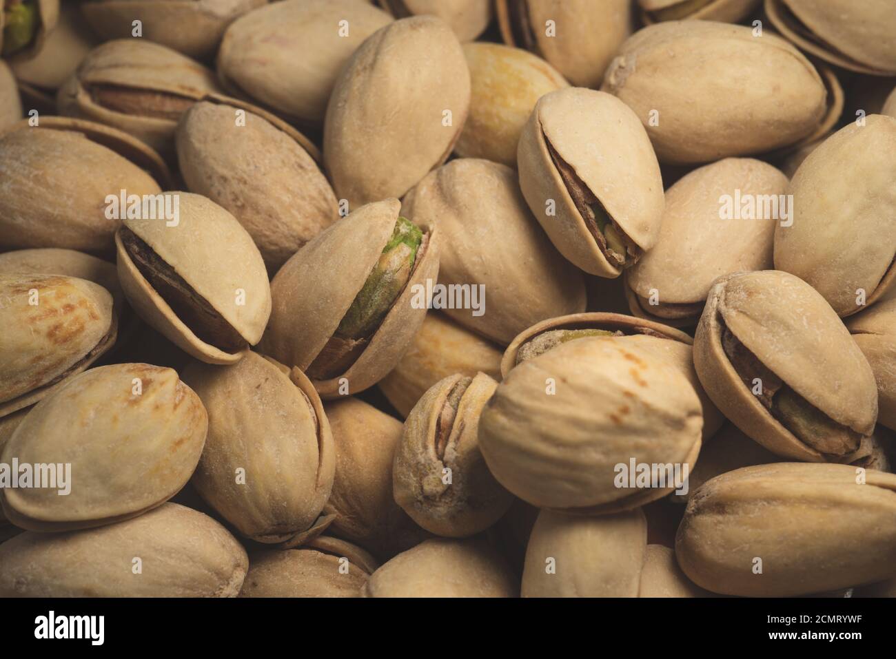 Macro close up portrait of organic pistachios , studio lighting ...