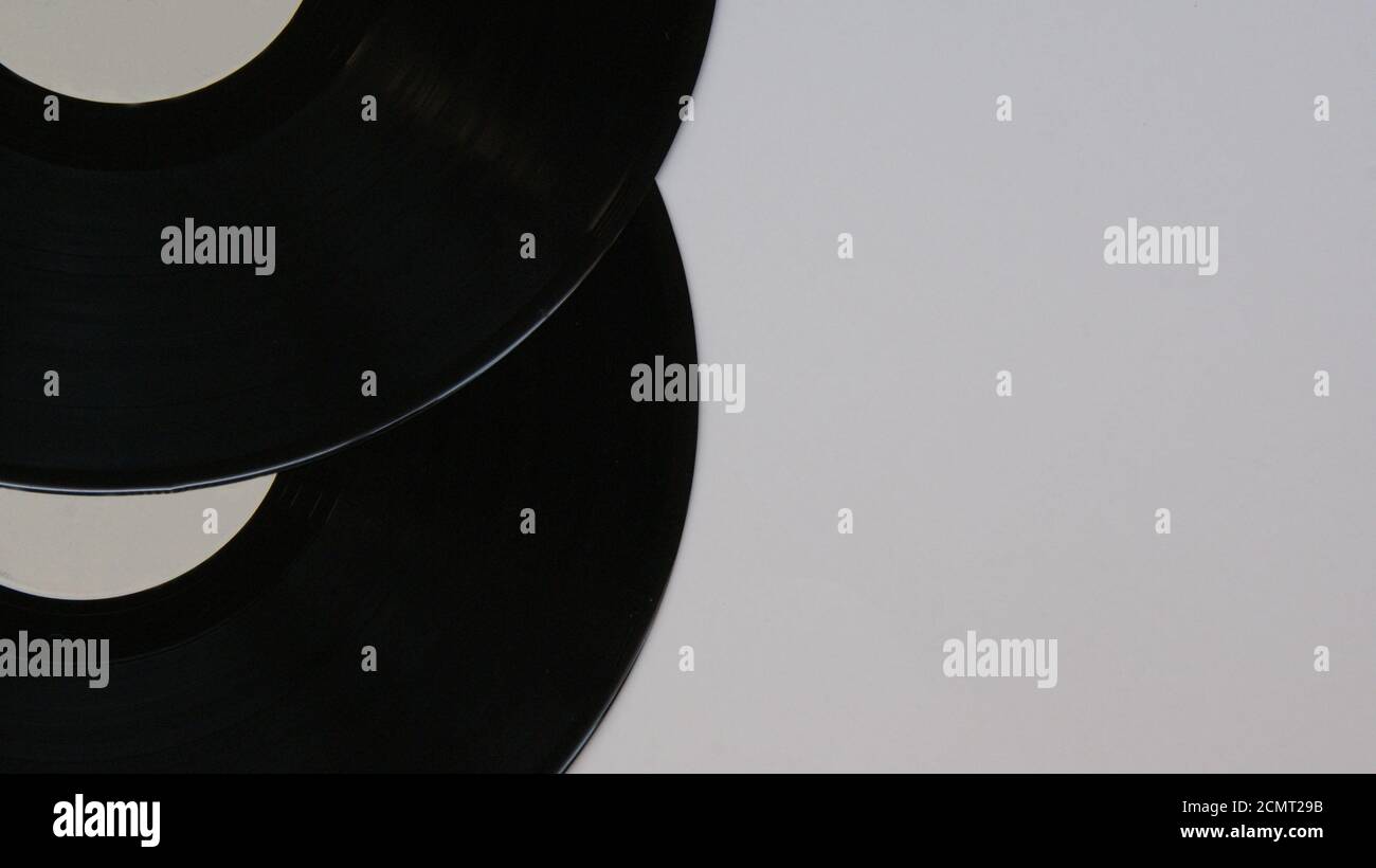 Vinyl record, detail of vinyl records, in cut, with two records showing ...
