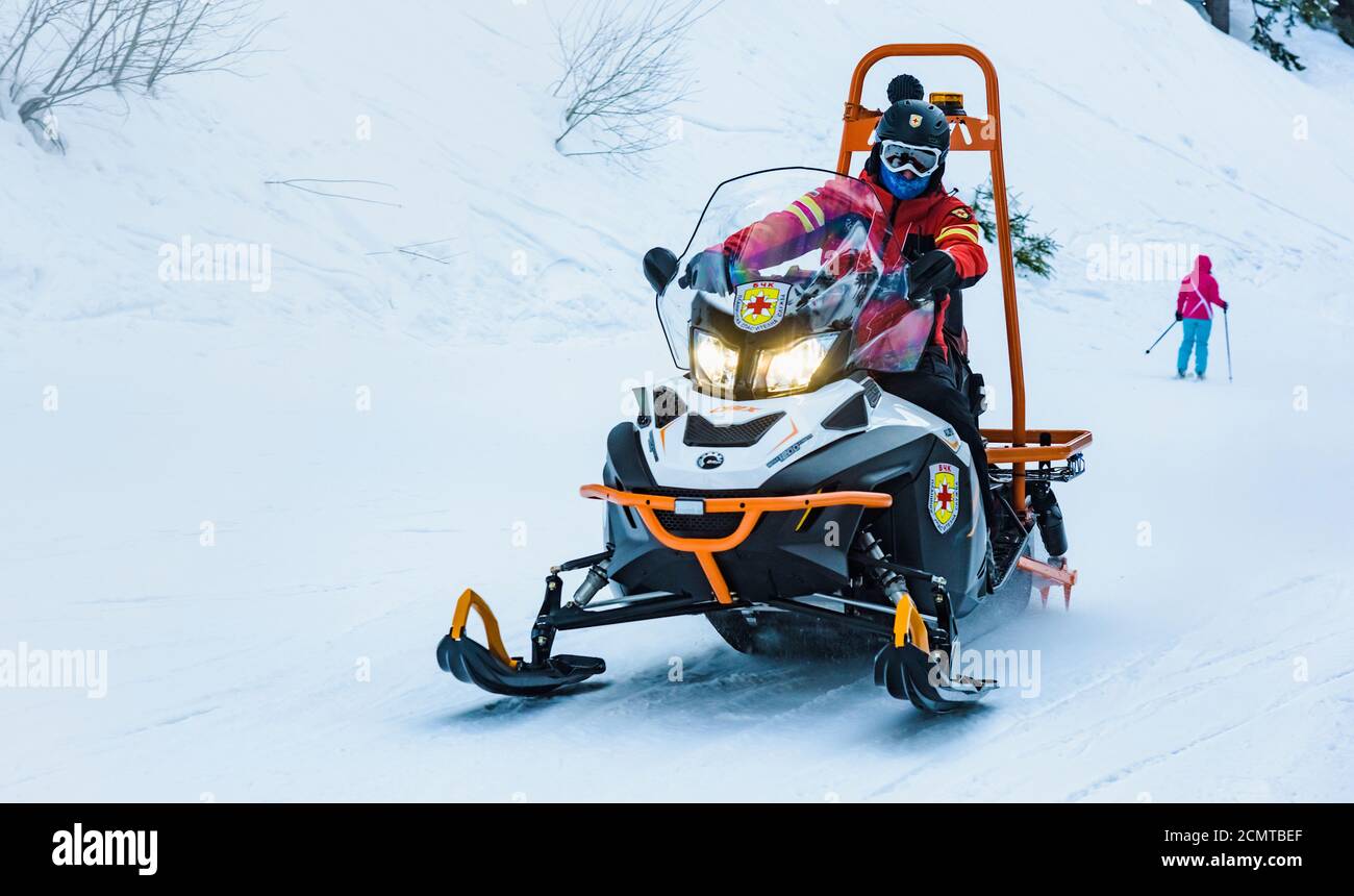 mountain rescue medical snowmobile Stock Photo - Alamy