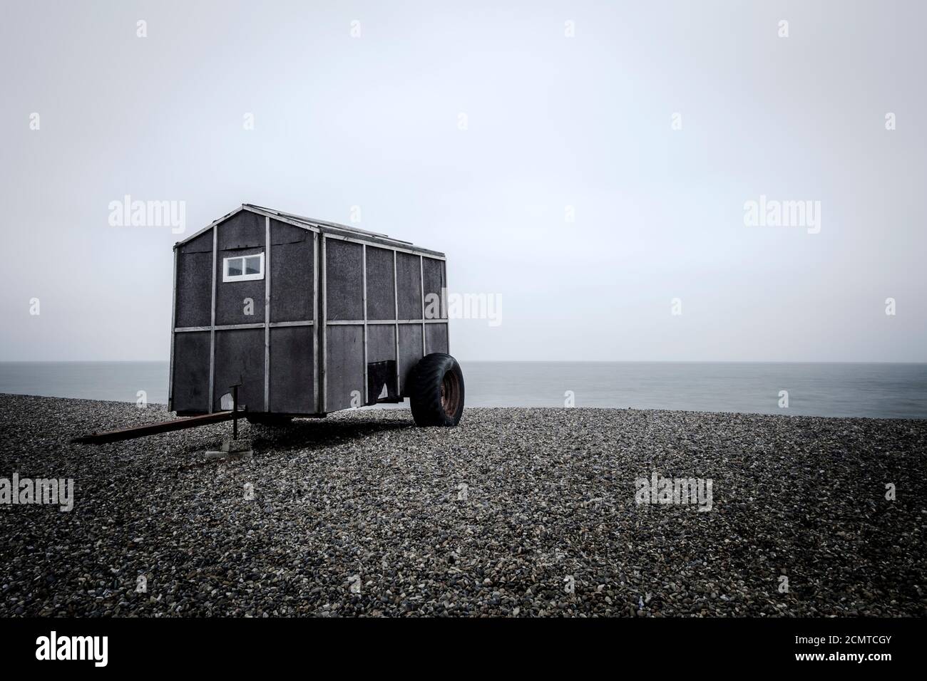 A wooden hut on wheels on the shingle beach at Weybourne Stock Photo ...