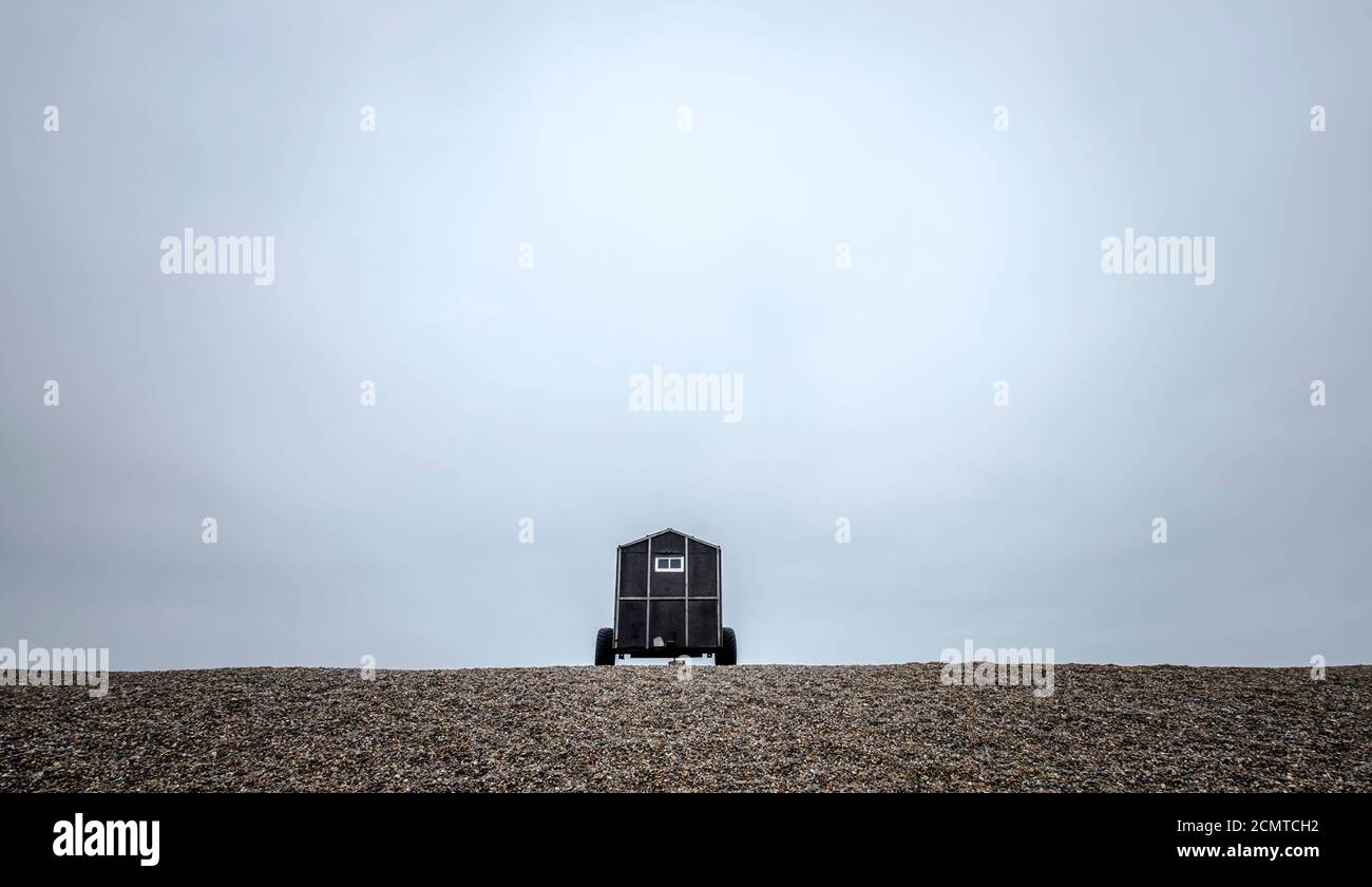 A wooden hut on wheels on the shingle beach at Weybourne Stock Photo ...