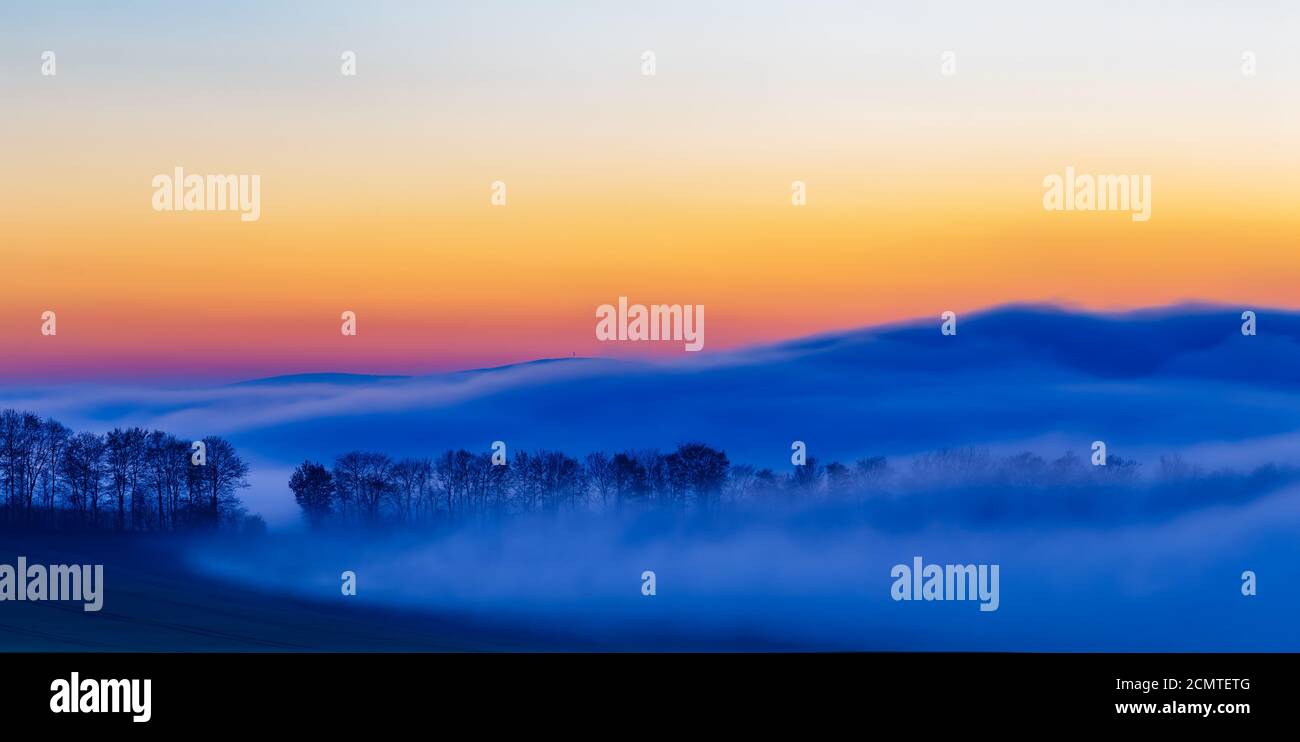 Evening fog covering mountain hi-res stock photography and images - Alamy