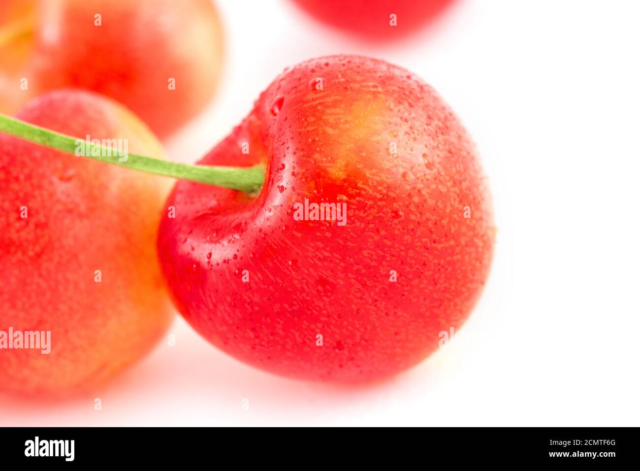 Sweet cherry isolated on white background Stock Photo - Alamy