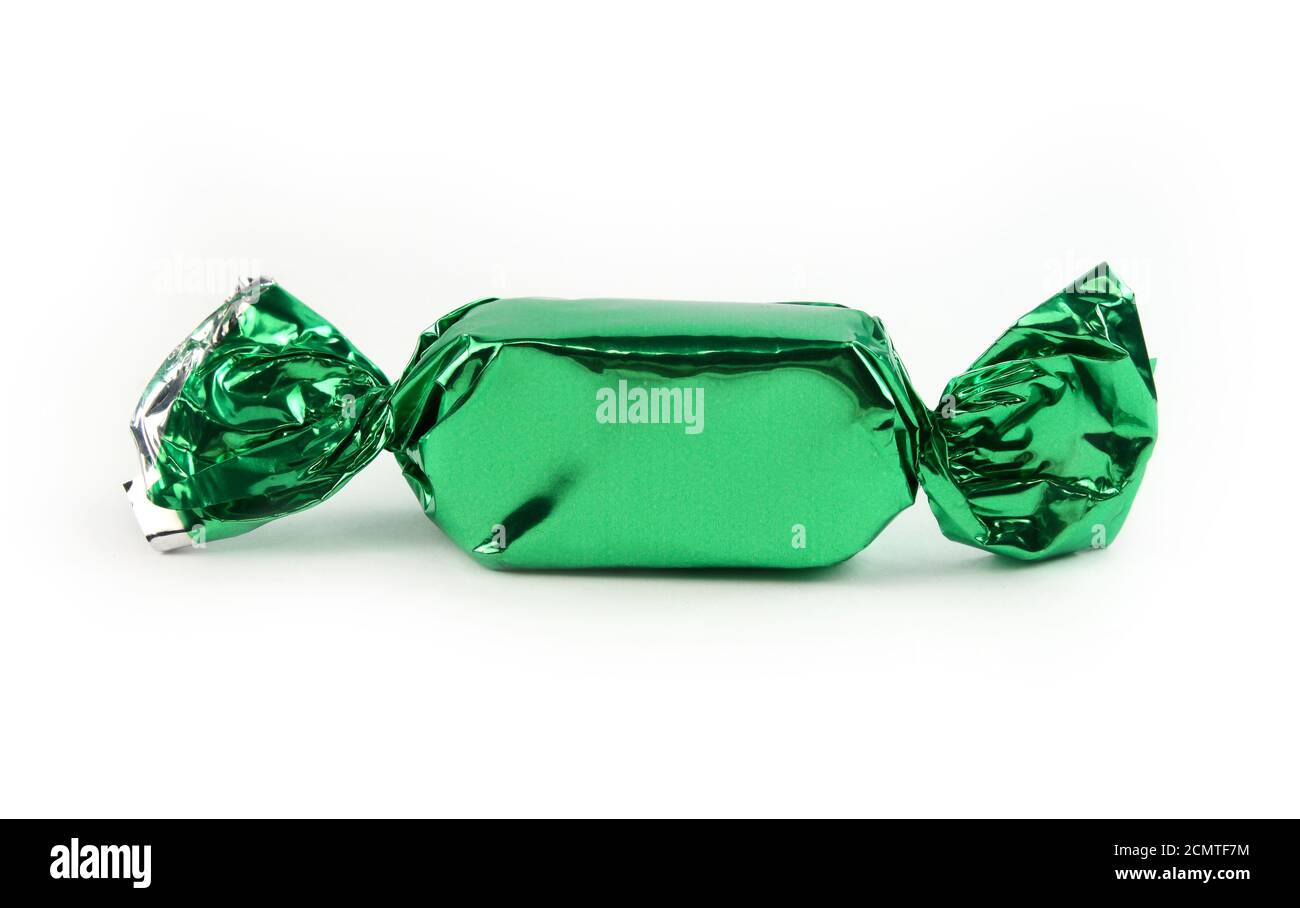 Single green candy wrapped isolated on white Stock Photo - Alamy