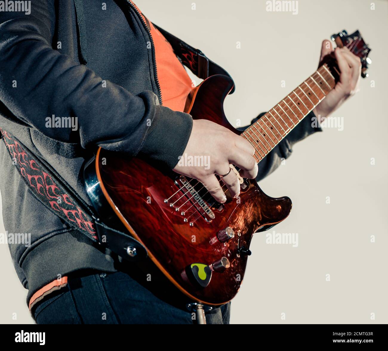 musician playing electric guitar on a stage Stock Photo - Alamy