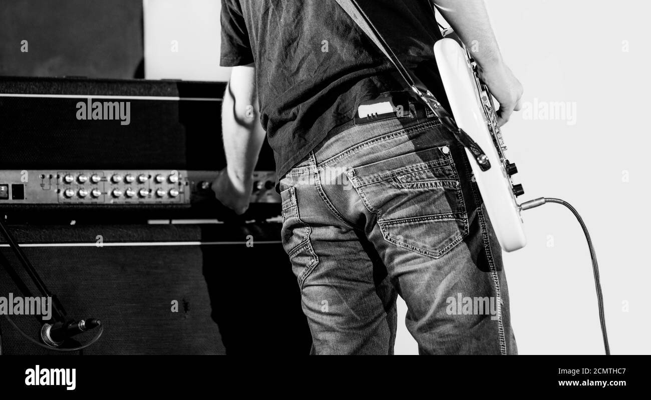Electric guitarist playing Black and White Stock Photos & Images - Alamy