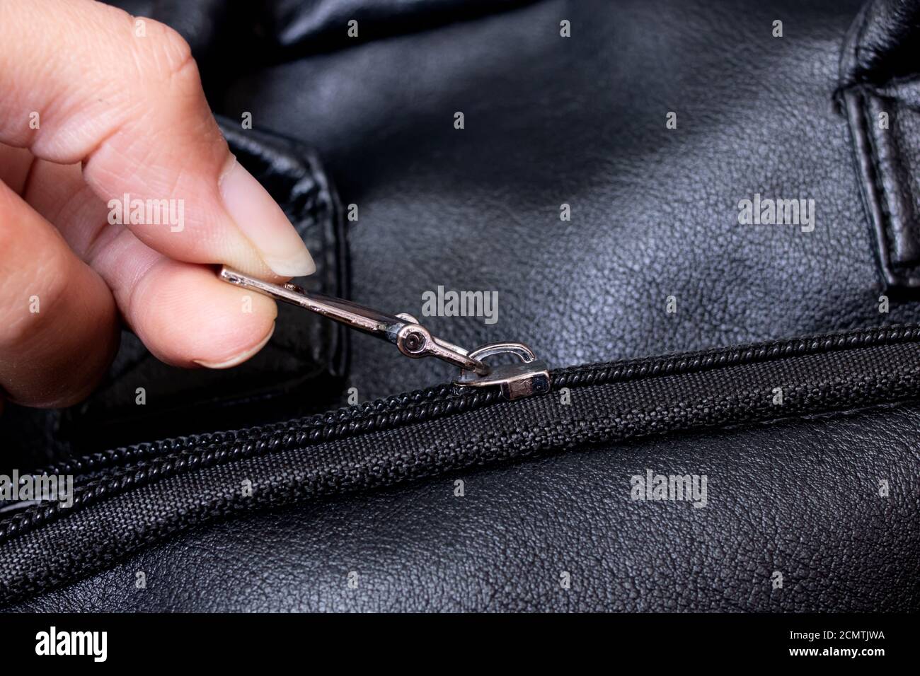 Hand opening bag hi-res stock photography and images - Alamy