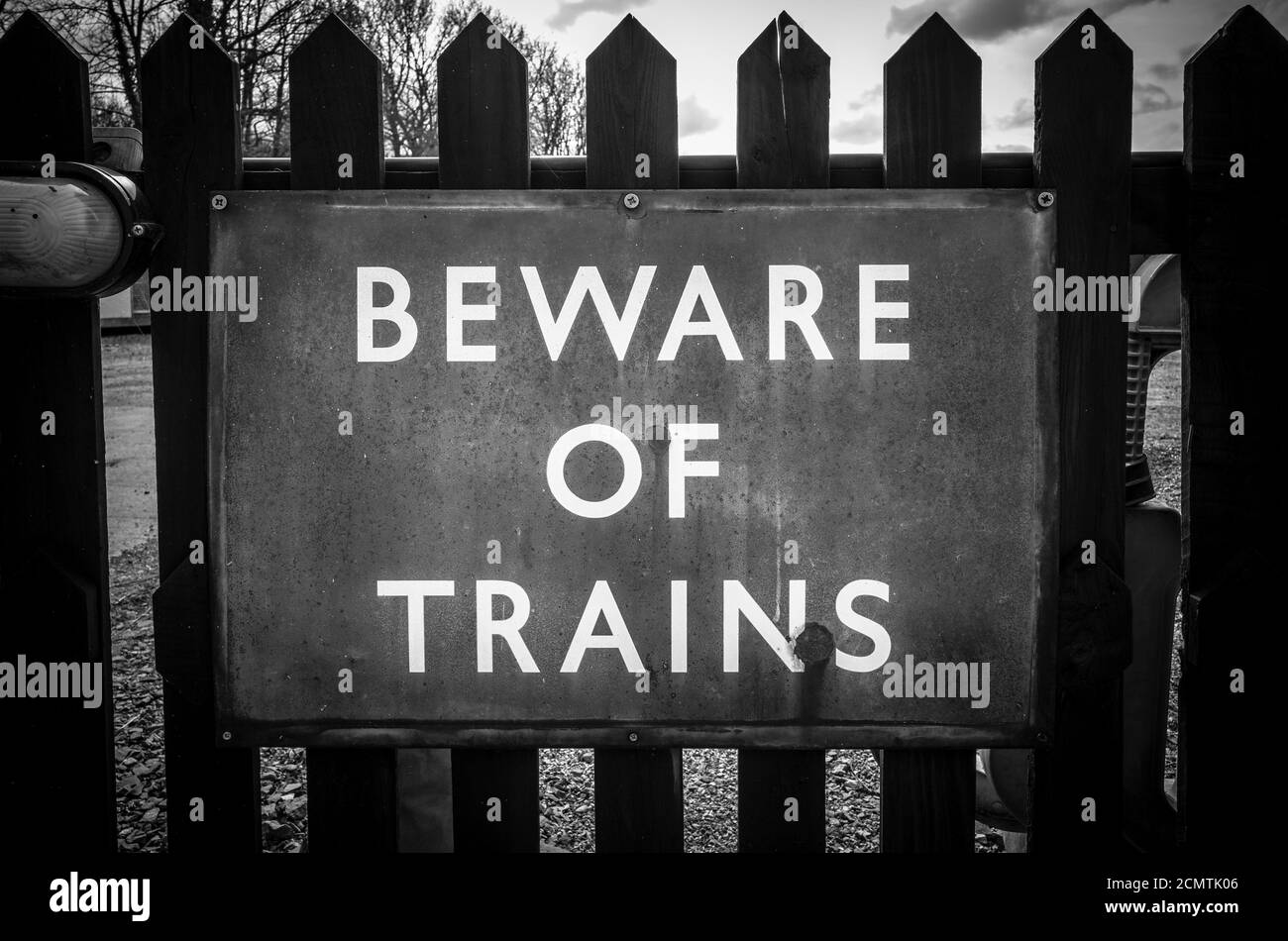 Sign on wooden fence Black and White Stock Photos & Images - Alamy