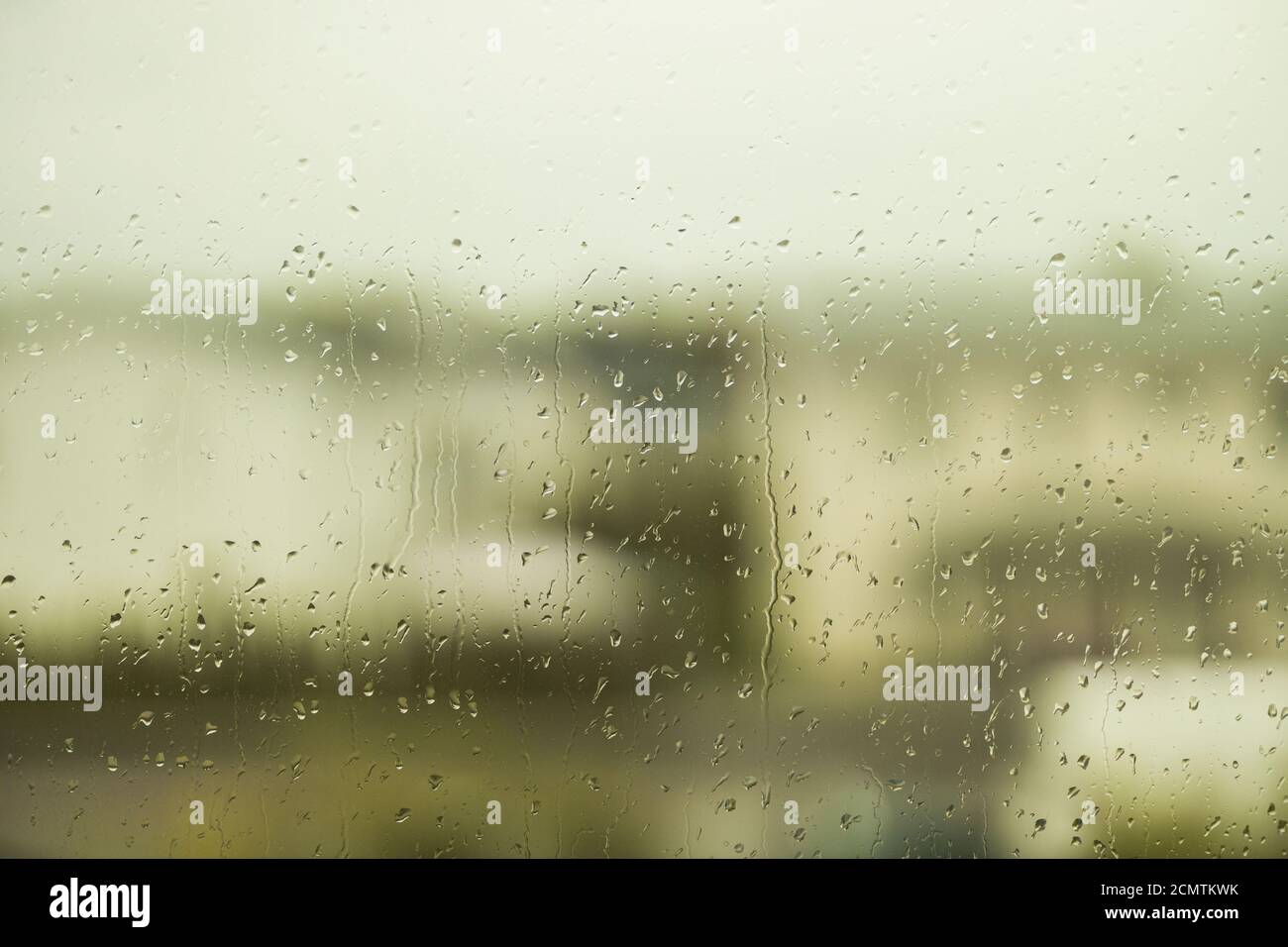 Beautiful view of raindrops running on window glass. Beautiful nature backgrounds Stock Photo ...