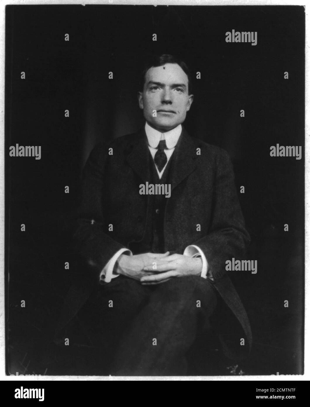 John D. Rockefeller, Jr., three-quarter length portrait, seated, facing ...