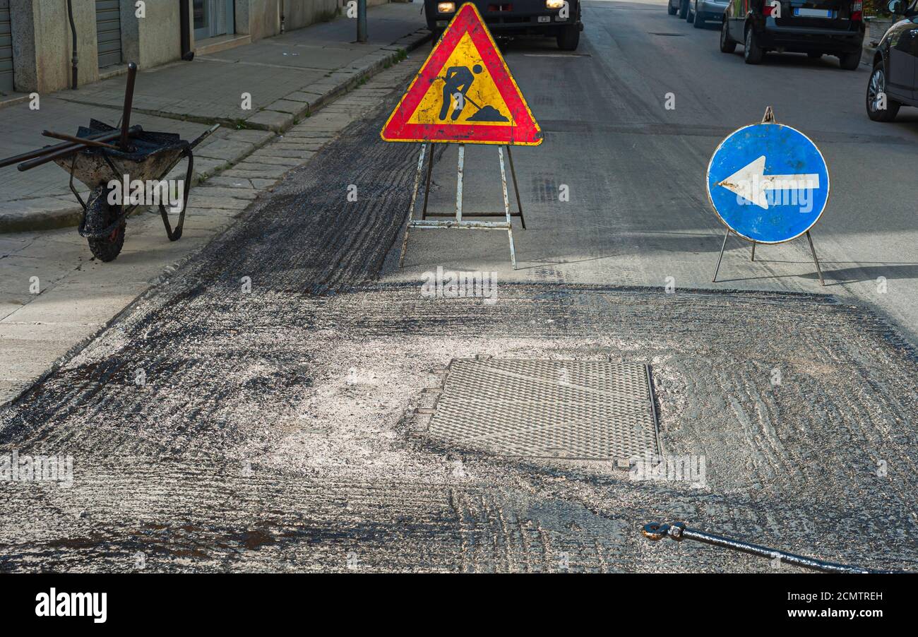 Worker movemen regulates the circulation of vehicles in an intersection ...