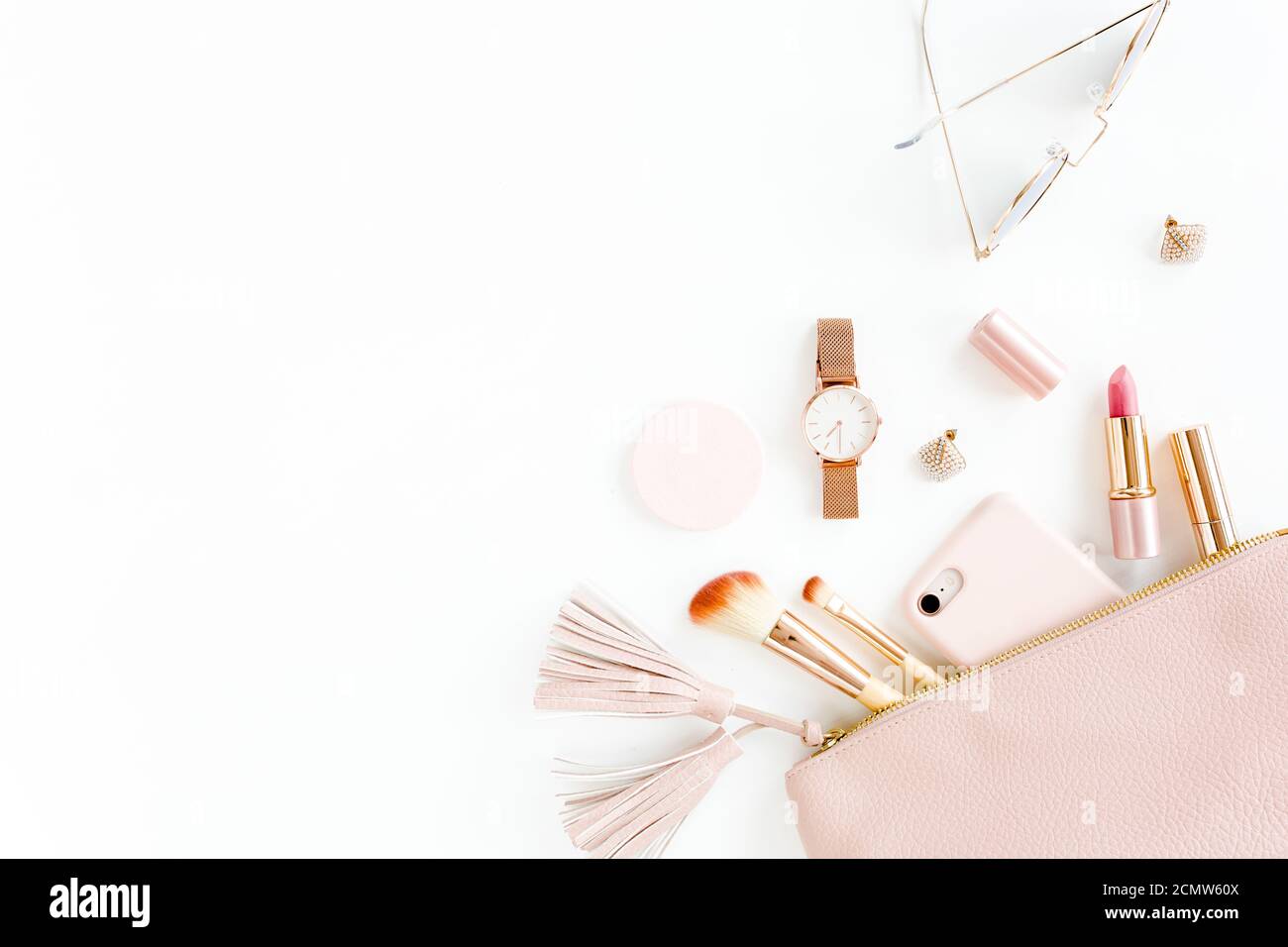 Flat lay composition with pink cosmetic bag with cosmetic makeup ...