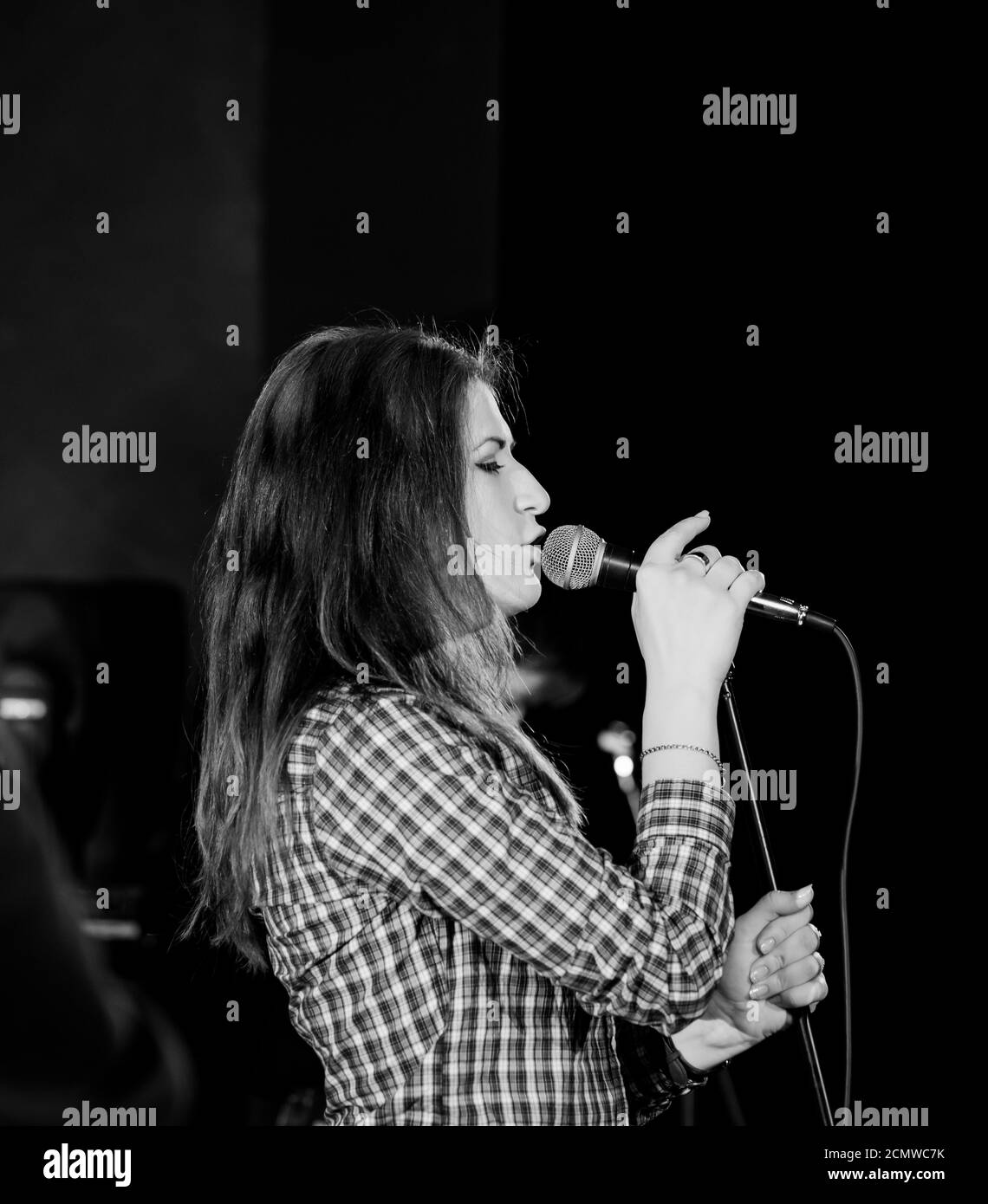 Woman singing music recording studio Black and White Stock Photos ...