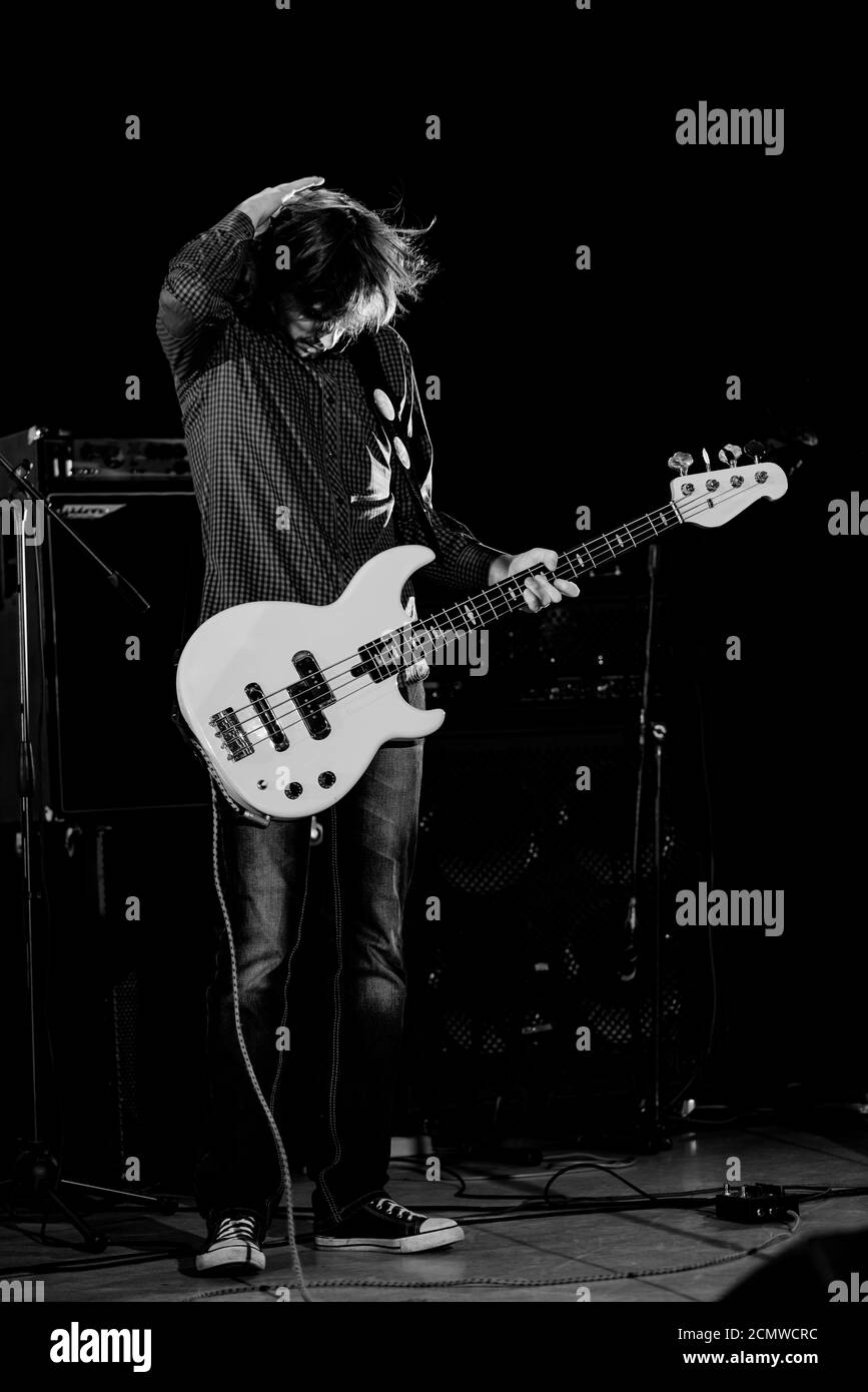 black and white guitarist portrait with guitar on stage Stock Photo - Alamy