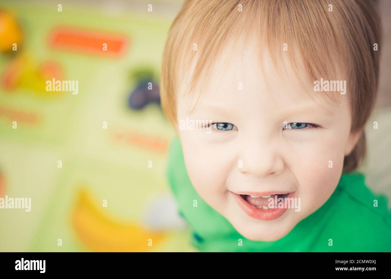 little positive boy portrait indoor Stock Photo - Alamy