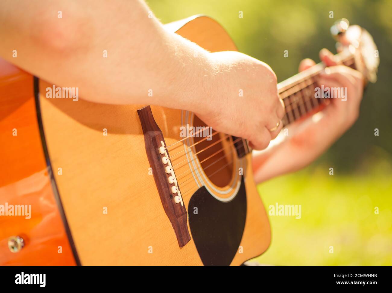 guitarist playing acoustic guitar outdoor Stock Photo - Alamy