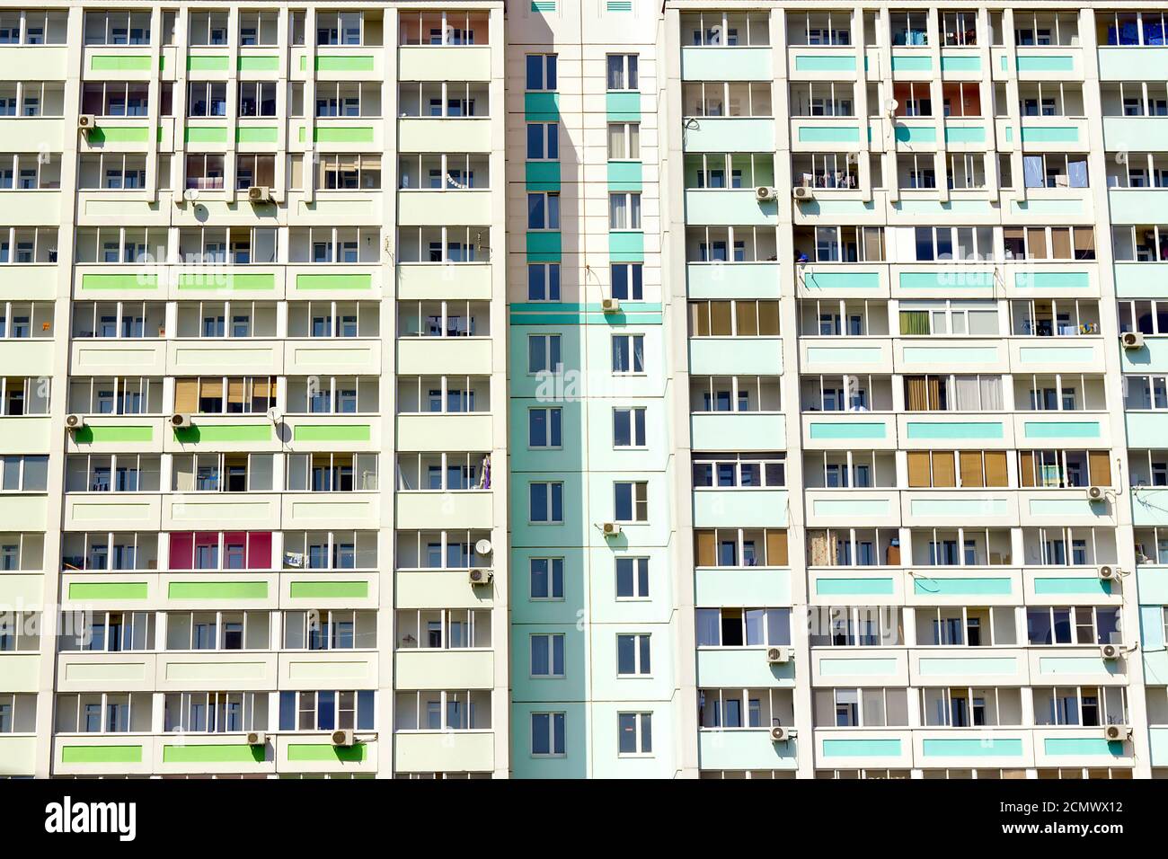 new multi-storey residential building in the background Stock Photo - Alamy
