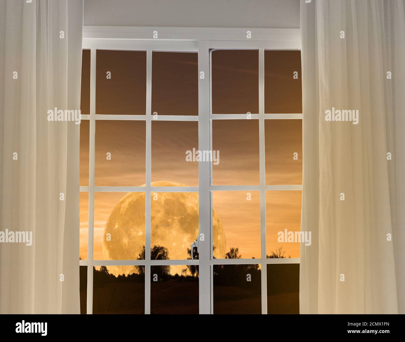 window view of the full moon Stock Photo - Alamy