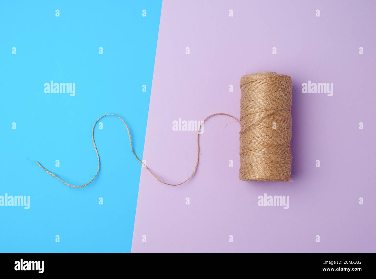 whole coil of twisted brown rope tourniquet Stock Photo - Alamy