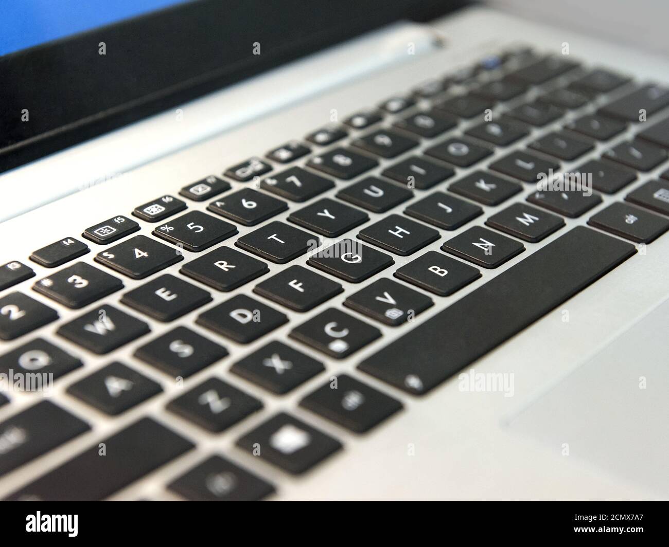 white laptop keyboard with black keys closeup Stock Photo - Alamy