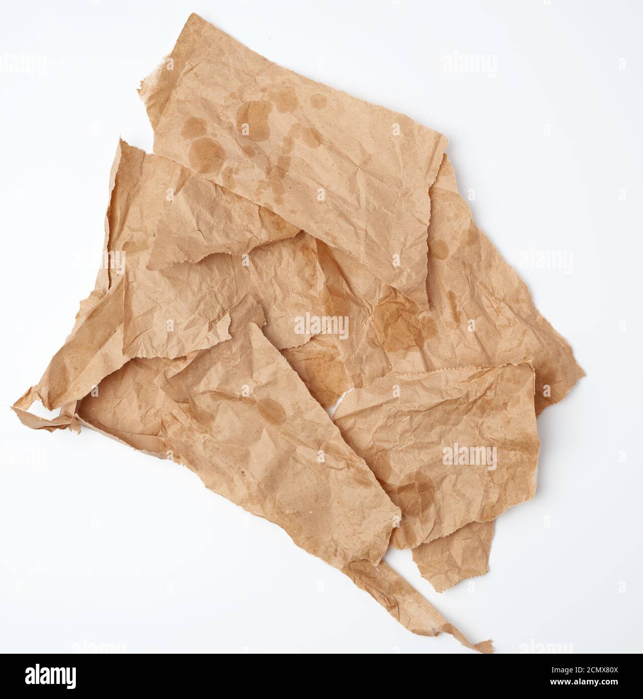 torn crumpled pieces of brown paper with grease stains Stock Photo - Alamy