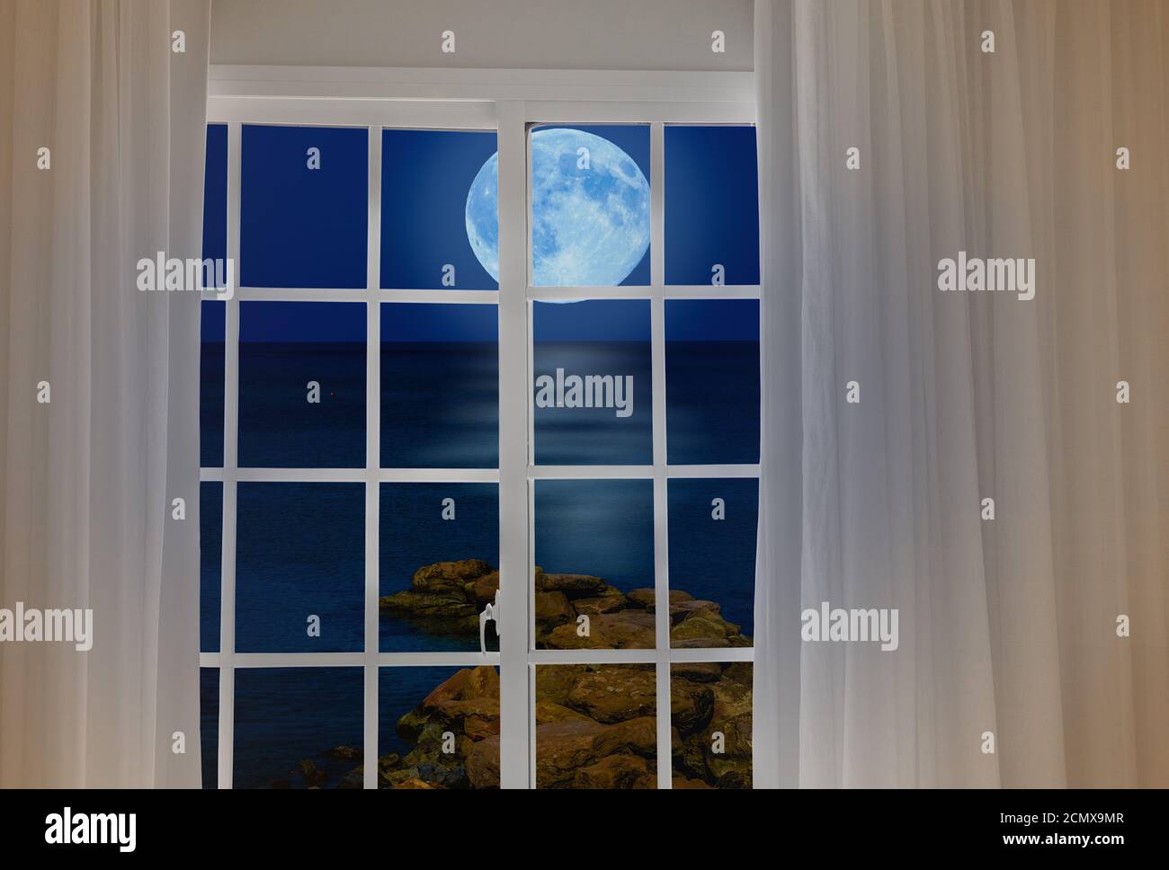 window view of the full moon Stock Photo - Alamy